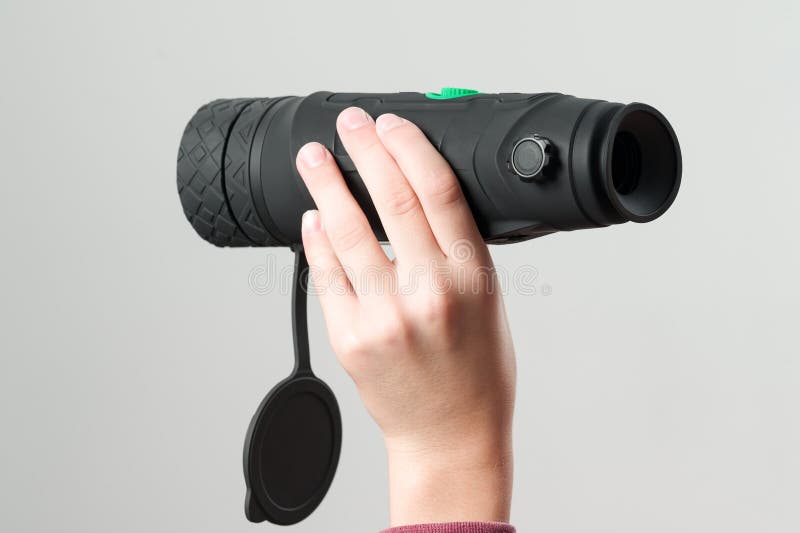 A Child Holds a Monocular in His Hand on a White Background. Stock ...