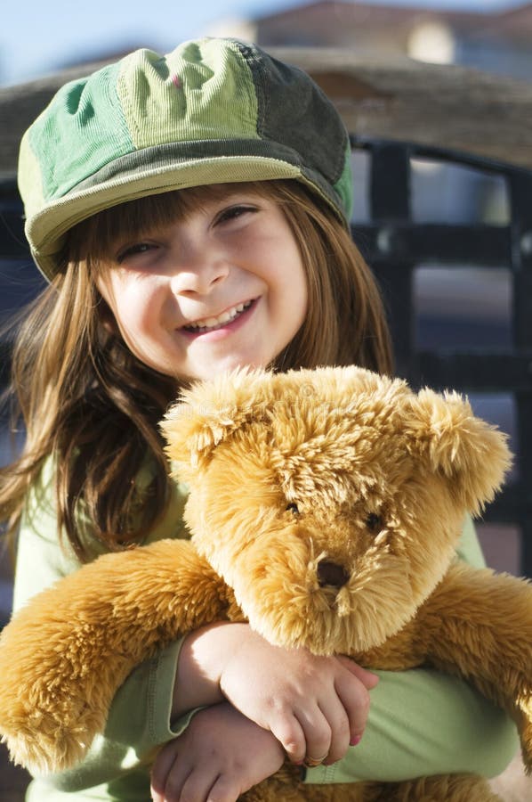 Child Hugging Her Teddy Bear Stock Image - Image of female, holding ...
