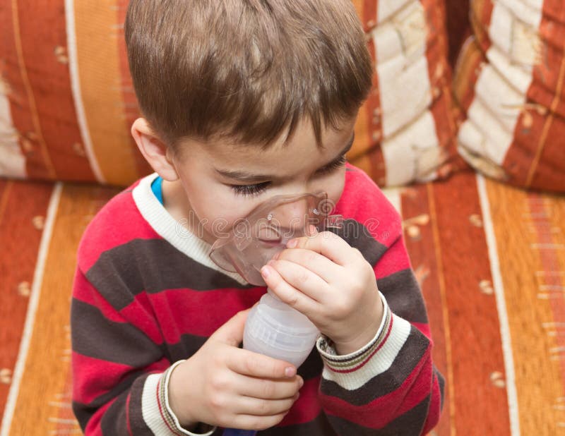 Child and inhaler stock photo. Image of male, asthmatic - 36748126