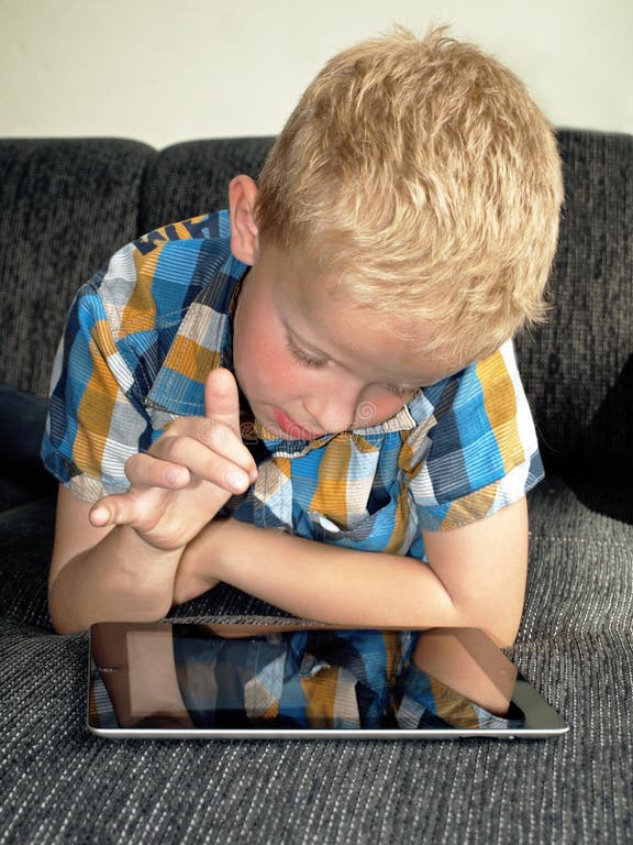 Child on ipad stock image. Image of samsung, learning - 23375469