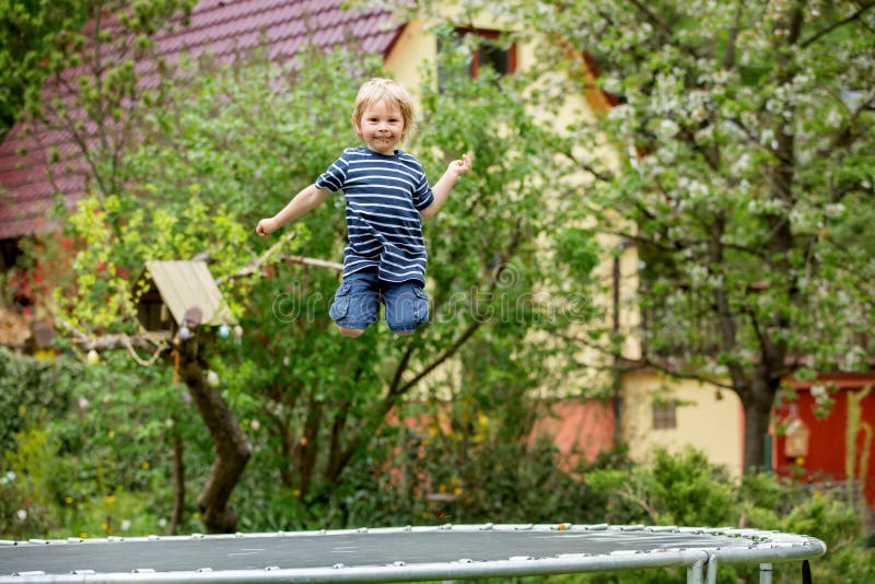 Child, Jumping High on a Trampoline Stock Image - Image of cute, active ...