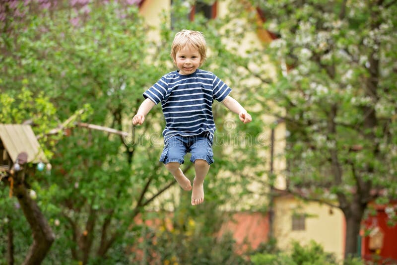 Child, Jumping in a Swimming Pool in Backyard Summertime Stock Photo ...