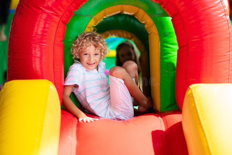 Child Jumping in Swimming Pool. Kids Swim Stock Photo - Image of ...