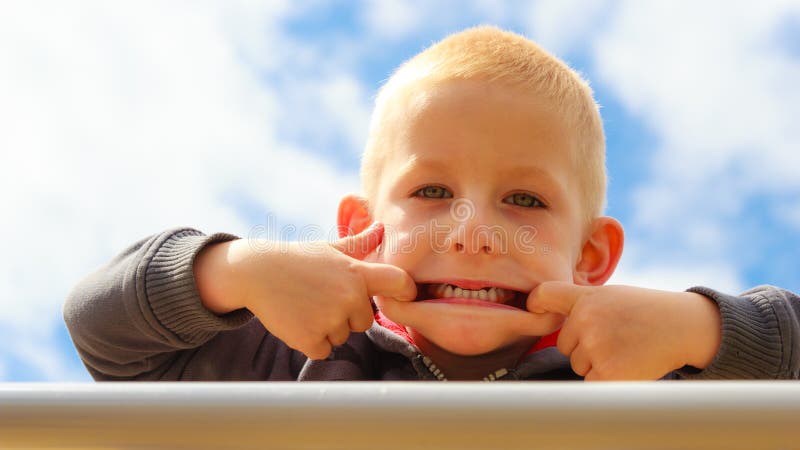 Child Kid Making Silly Face. Childhood. Stock Image - Image of mouth ...
