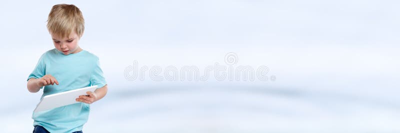 Child Kid Young Little Boy Typing Showing on Tablet Computer Int Stock ...