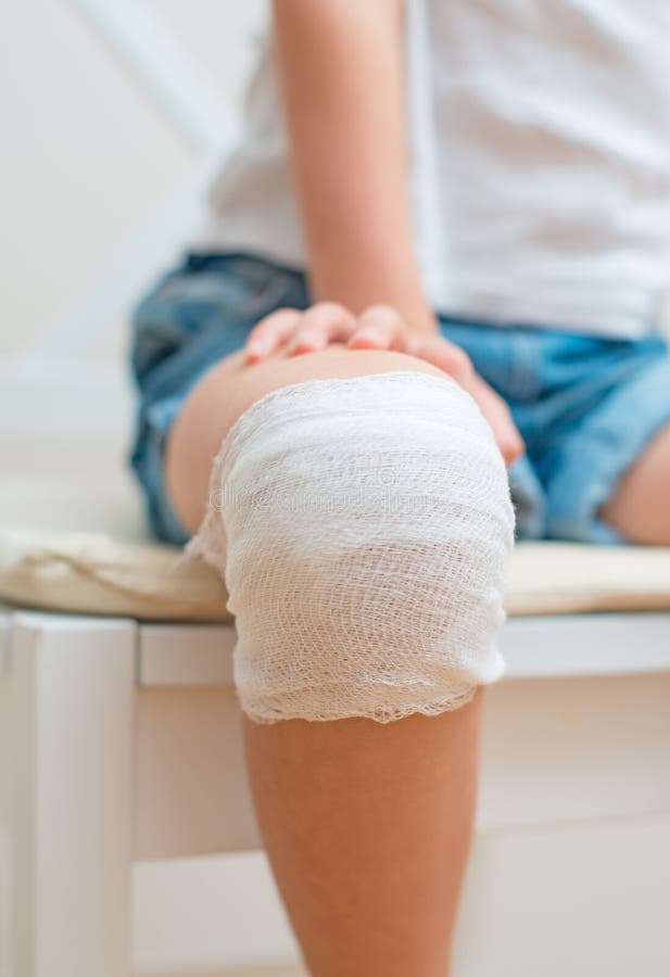 Child Knee with Adhesive Bandage. Stock Image - Image of close ...