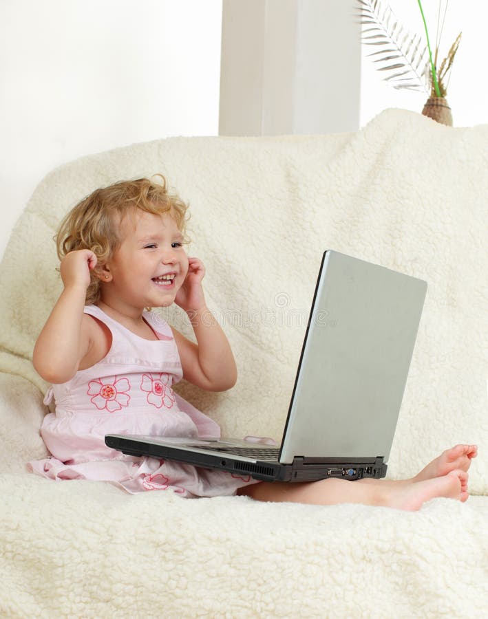 Child with laptop stock photo. Image of baby, living - 12591278