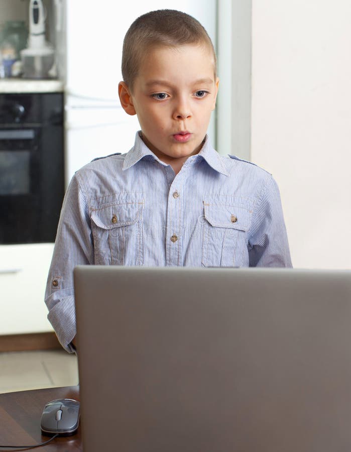 Child with laptop stock image. Image of male, education - 20455649