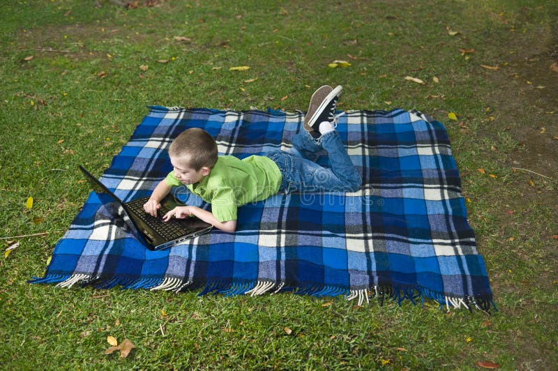 Child and Laptop in the Garden Stock Photo - Image of notebook, garden ...