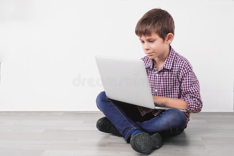 Child with Laptop Sitting on the Floor Stock Photo - Image of ...