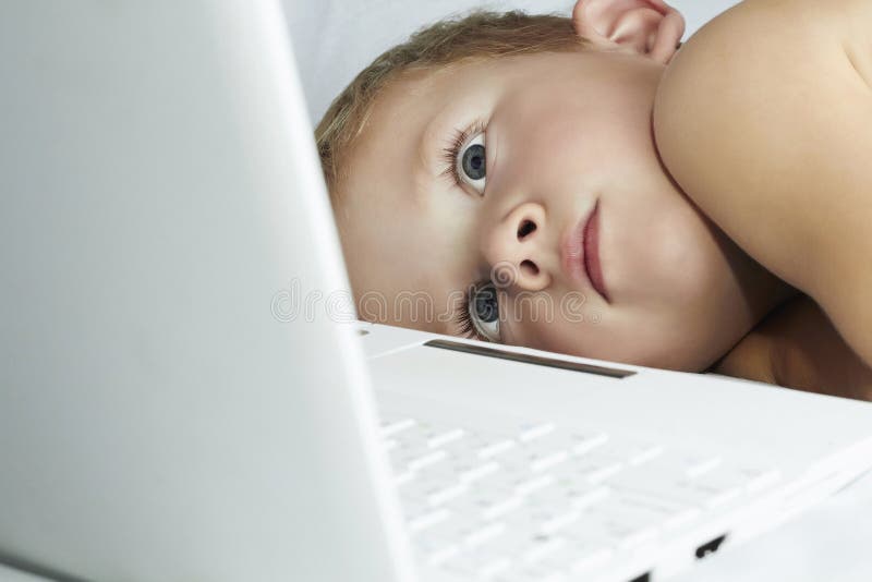 Child with Laptop. 4 Years Old Boy Watching Computer Stock Photo ...