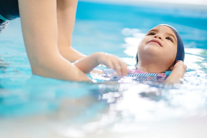 Child Learn To Float on Back Stock Photo - Image of pool, sport: 241466718