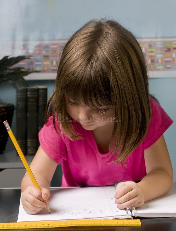 Child Learning In Classroom Stock Photo - Image of cute, elementary ...