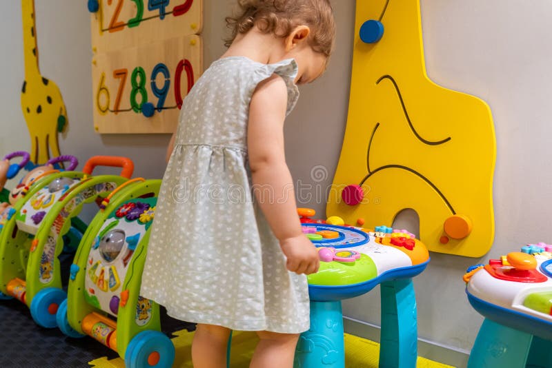 Child Learning with Interactive Table in Fun Playroom. Concept of ...