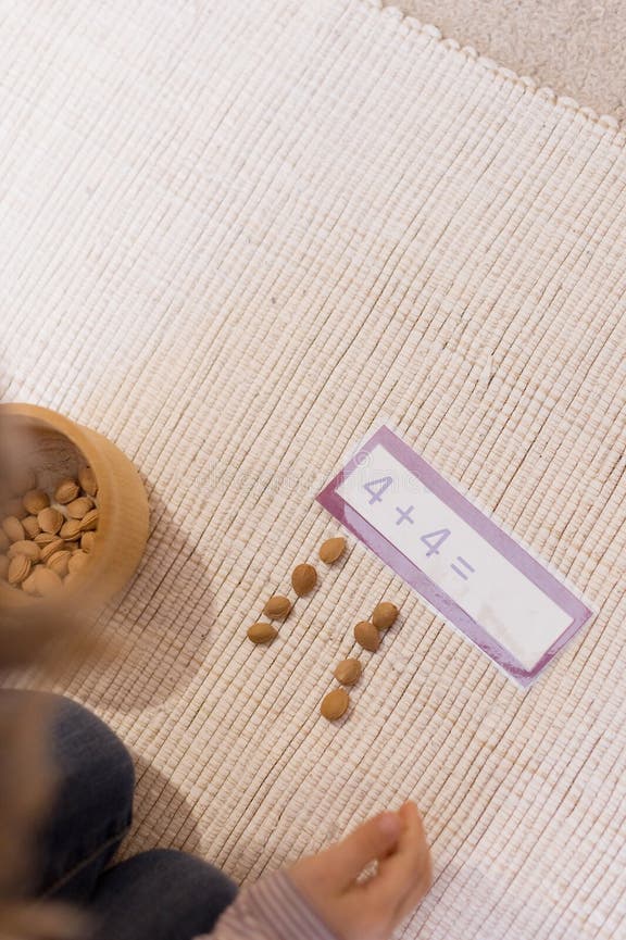 Child Learning Math with Wooden Counters Stock Photo - Image of ...