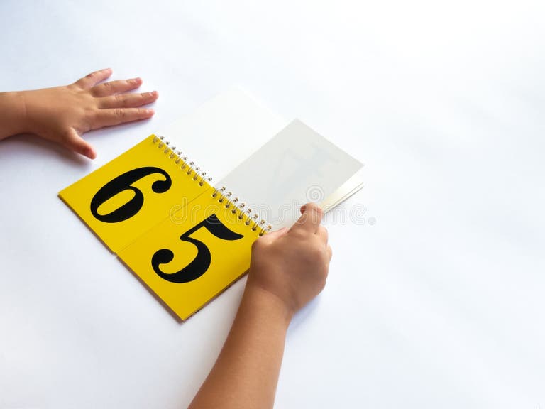 Child Learning Numbers with Flashcards and Hands on a White Background ...