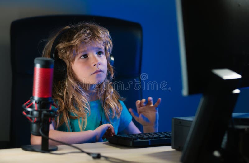 Child Learning Online at Night, Using Desktop Computer in Living Room ...