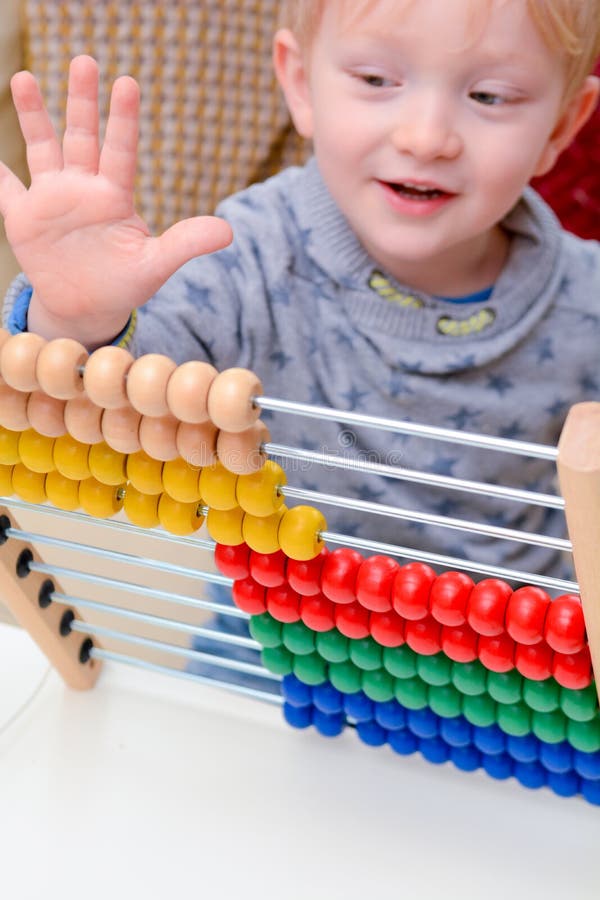 Young Child Counting with an Abacus Stock Image - Image of child, math ...