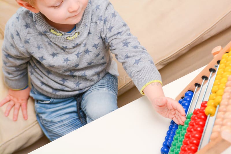 Young Child Counting with an Abacus Stock Photo - Image of learning ...