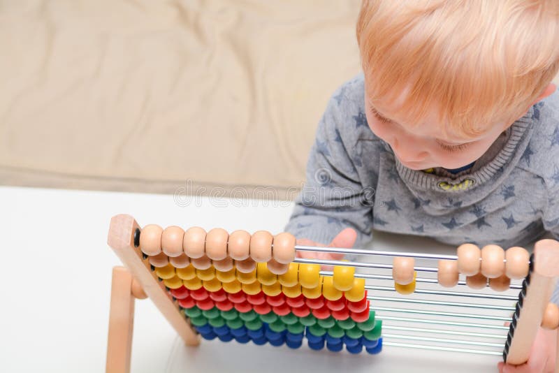 Young Child Counting with an Abacus Stock Photo - Image of happy ...