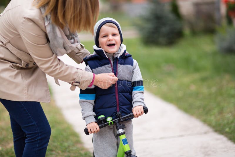 Child Learning To Ride Bicycle Stock Photo - Image of child, bike: 78972298