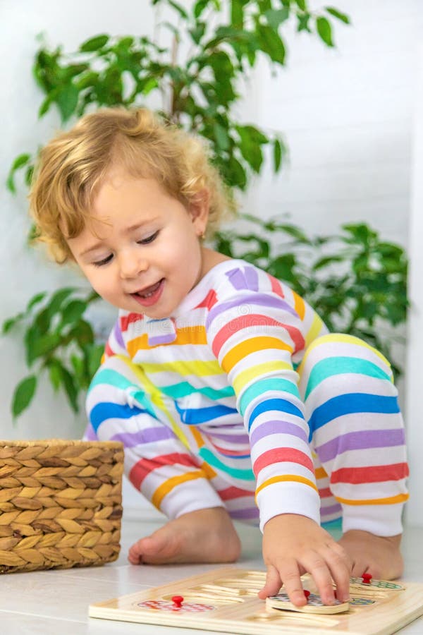 Child Learns Numbers Game Logic. Selective Focus Stock Image - Image of ...