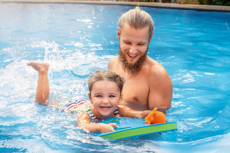 Child Learns To Swim in the Pool Stock Photo - Image of laughing ...