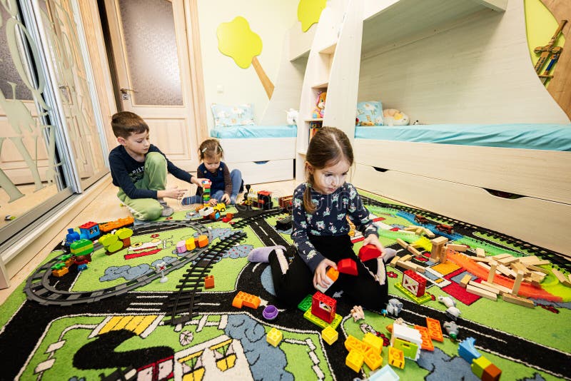 Child Leisure Activity, Creative Game. Kids Play at Home with Toy Train ...