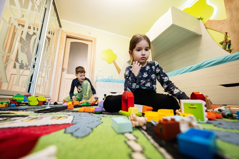 Child Leisure Activity, Creative Game. Kids Play at Home with Toy Train ...