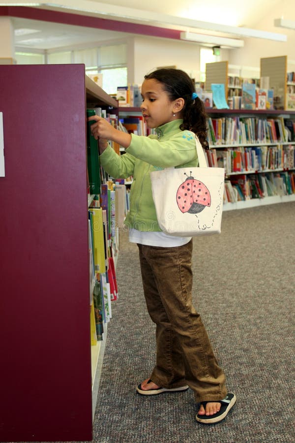 Child in Library stock image. Image of homeschool, elementary - 1034577