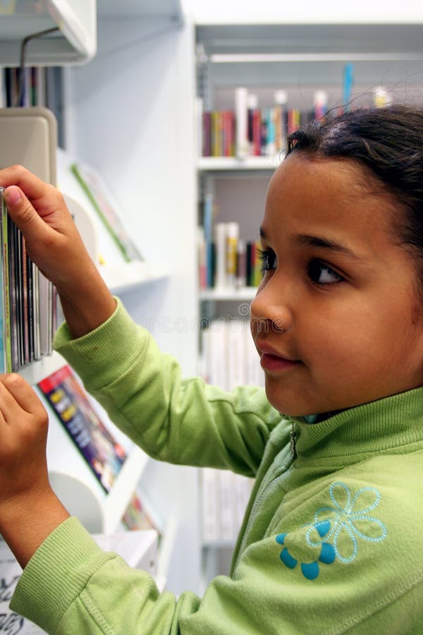 Child in Library stock photo. Image of multiple, learn - 729138