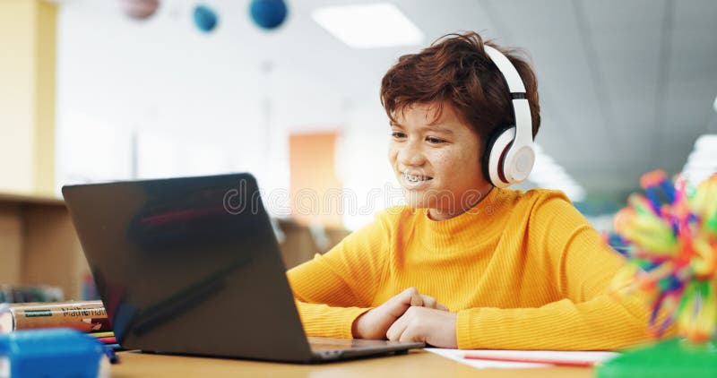 Child, Library and Headphones with Laptop for Video Call, E Learning or ...