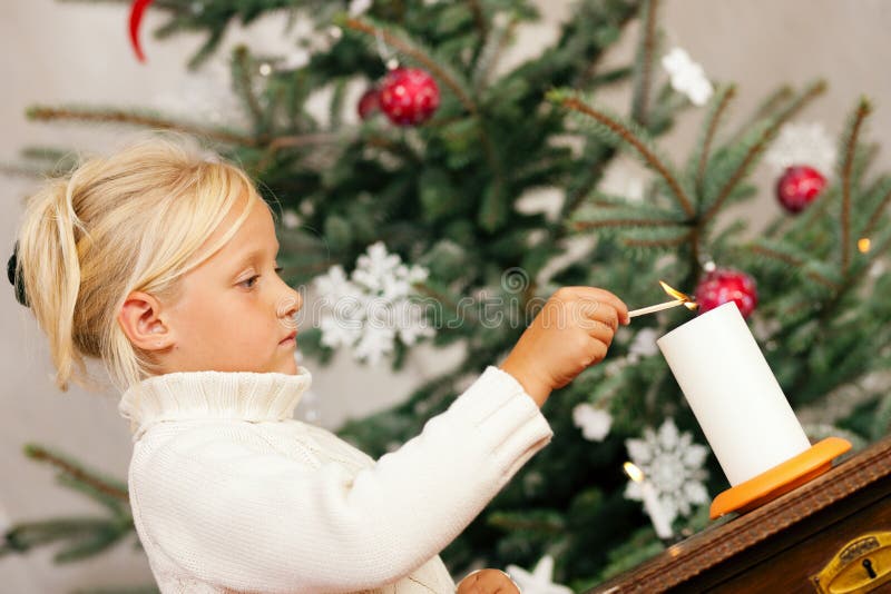 Child Lighting Christmas Candles Stock Photo - Image of lighting ...