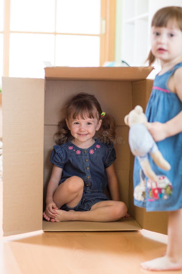 Child Little Girl Inside Box Stock Image - Image of barefoot, girl ...