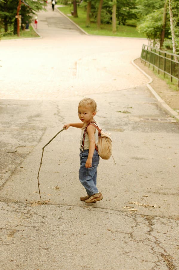 Child look back. stock image. Image of stick, alley, gaze - 10351495