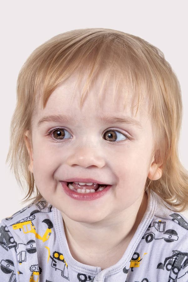 Child Looking Carefully with Interest and Smiling Stock Image - Image ...