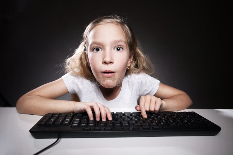 Child Looking at a Computer Stock Photo - Image of addiction ...