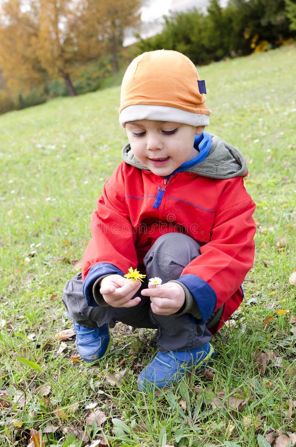 Child in flowers stock photo. Image of outdoor, childhood - 17925612