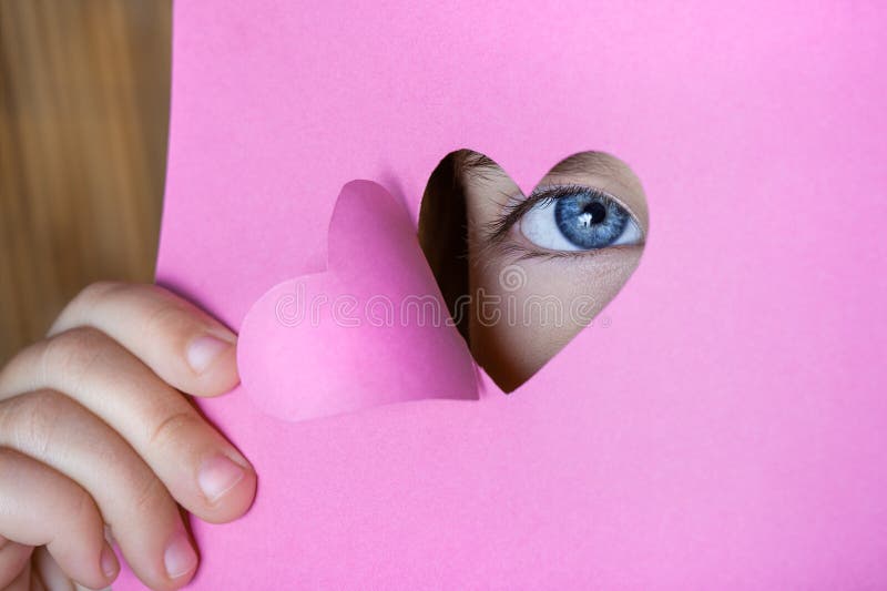 Child Looking through a Heart Shape Card Stock Image - Image of ...