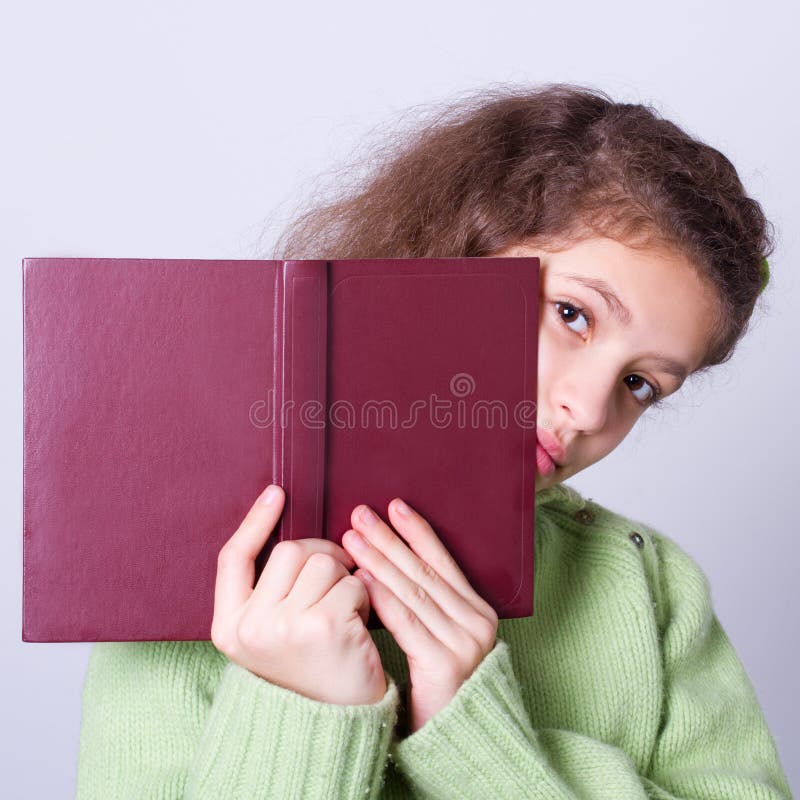 Child reading a book stock image. Image of kindergarten - 2917887
