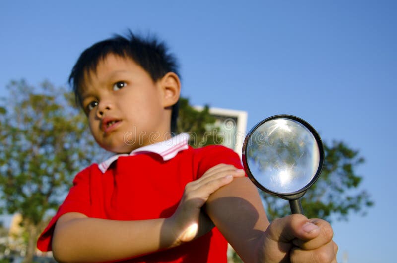 Child with a Magnifying Glass Stock Photo - Image of eyes, education ...