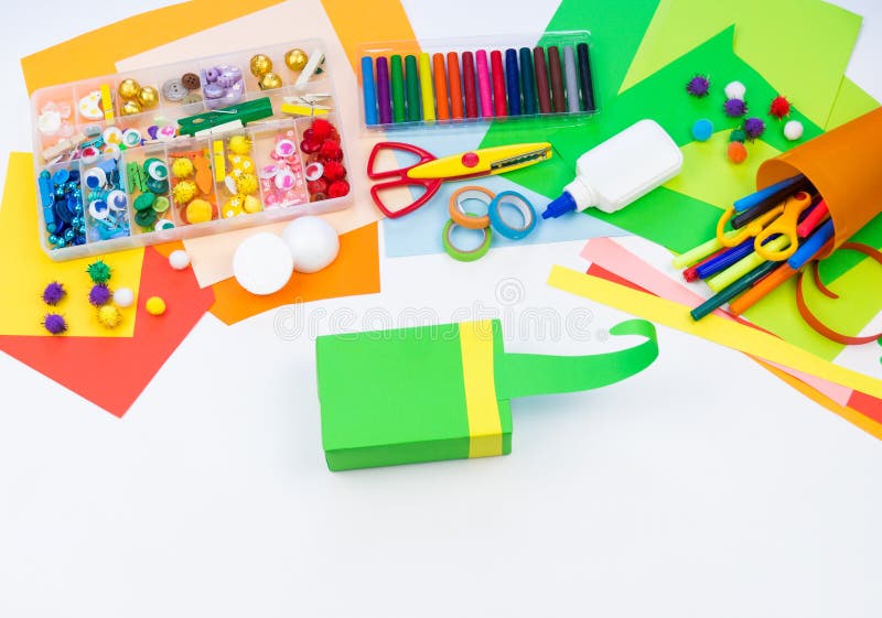 Child Makes a Hack Box Chameleon. Material for Creativity on a White ...