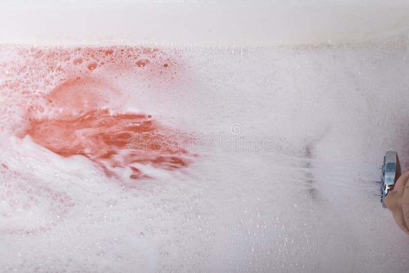 The Child Makes Lather in the Bath with the Shower. Red Water Stock ...