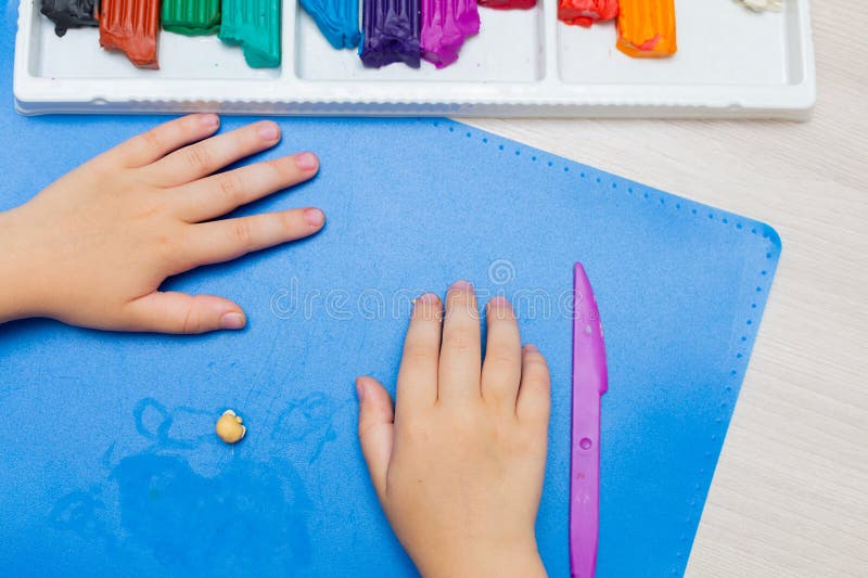 A Child Makes Plasticine.child Play with Plasticine Stock Photo - Image ...