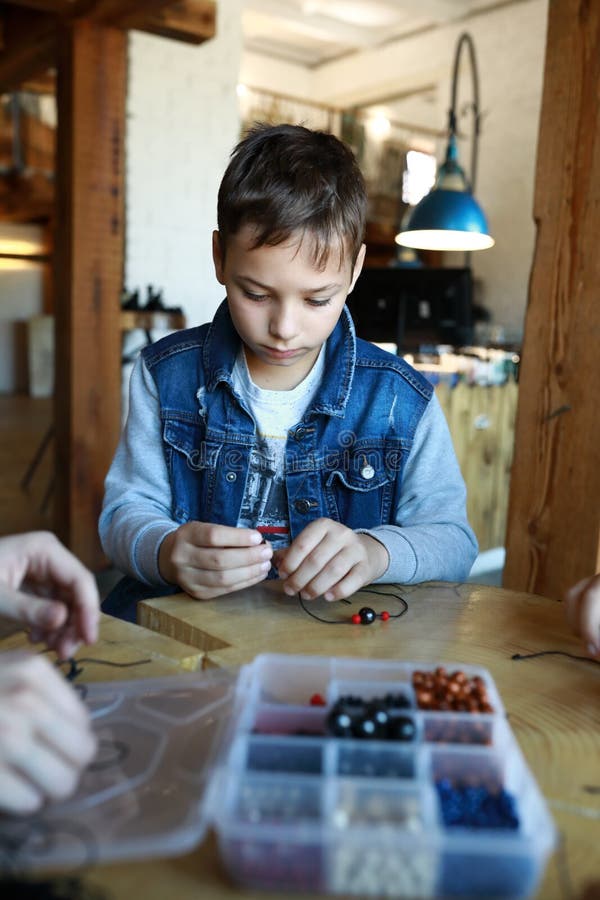 Child Making Bracelet at Workshop Stock Photo - Image of jewelry ...
