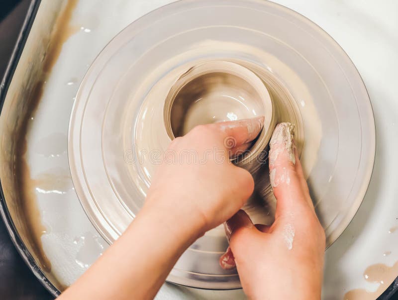 Child Making Ceramic Vase on Rotating Pottery Wheel at Workshop ...
