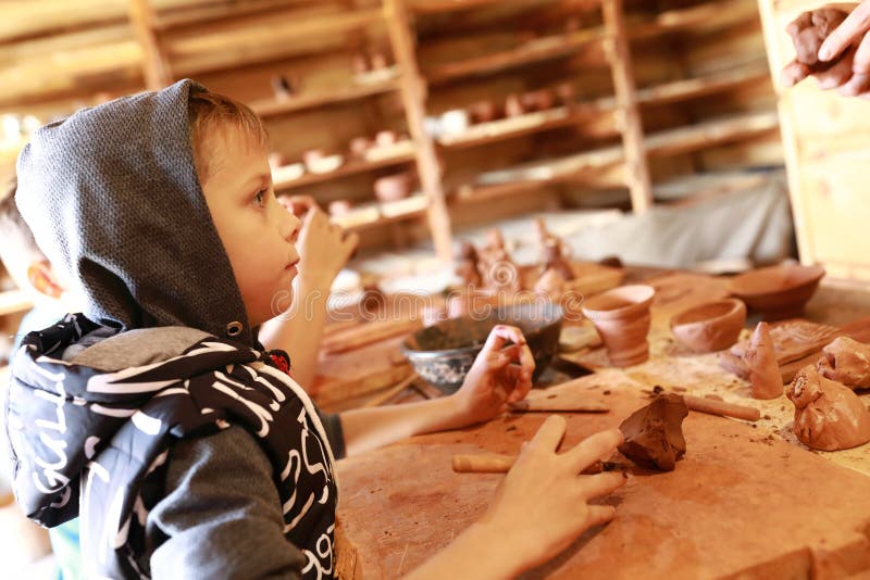 Child Making Clay Crafts at Table Stock Photo - Image of potter, hand ...