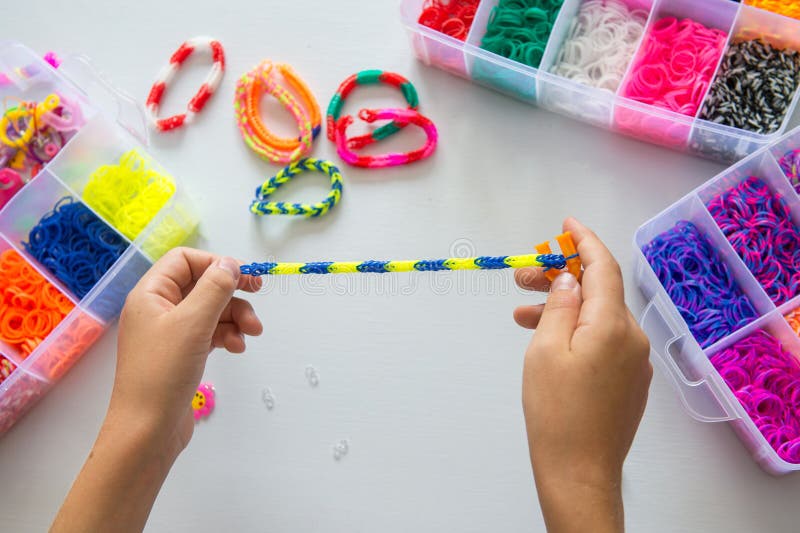 Child Making Colorful Rubber Band Bracelet with a Loom Tool Stock Image ...