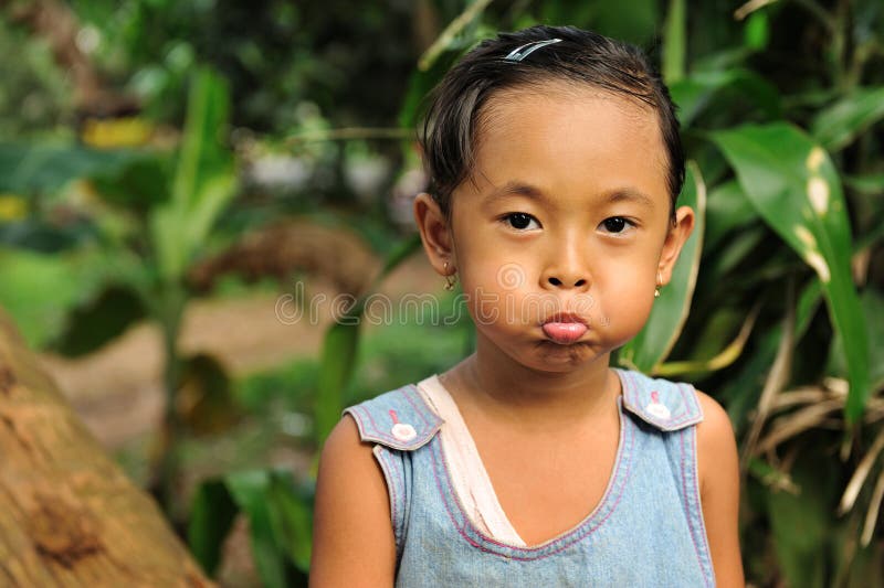 Child Making Faces stock photo. Image of look, childhood - 14961794