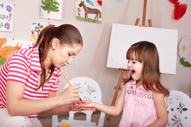 Child making handprints. stock image. Image of interior - 15124657